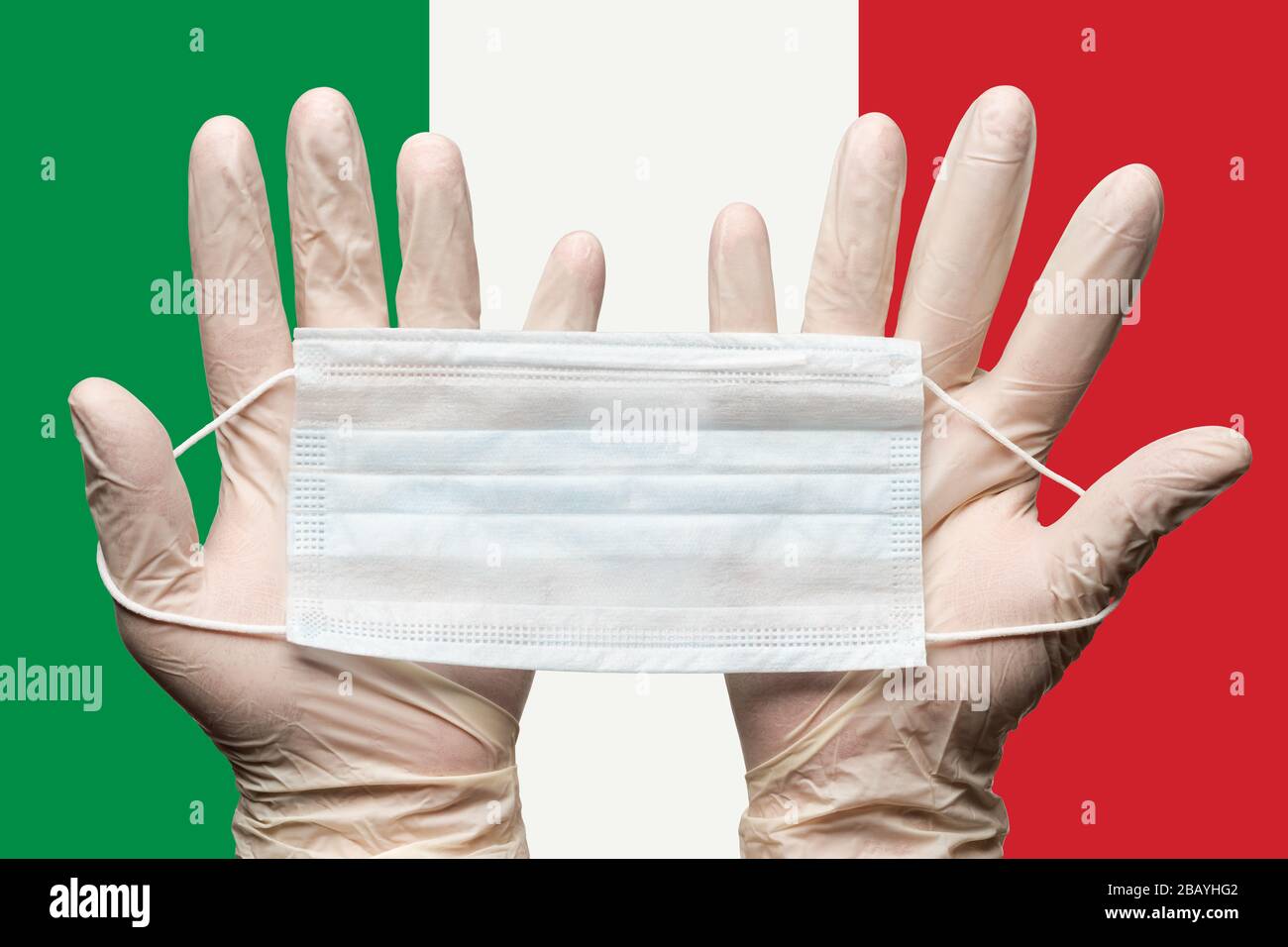 Paramedic holding respiratory face mask in two hands in white gloves on ...
