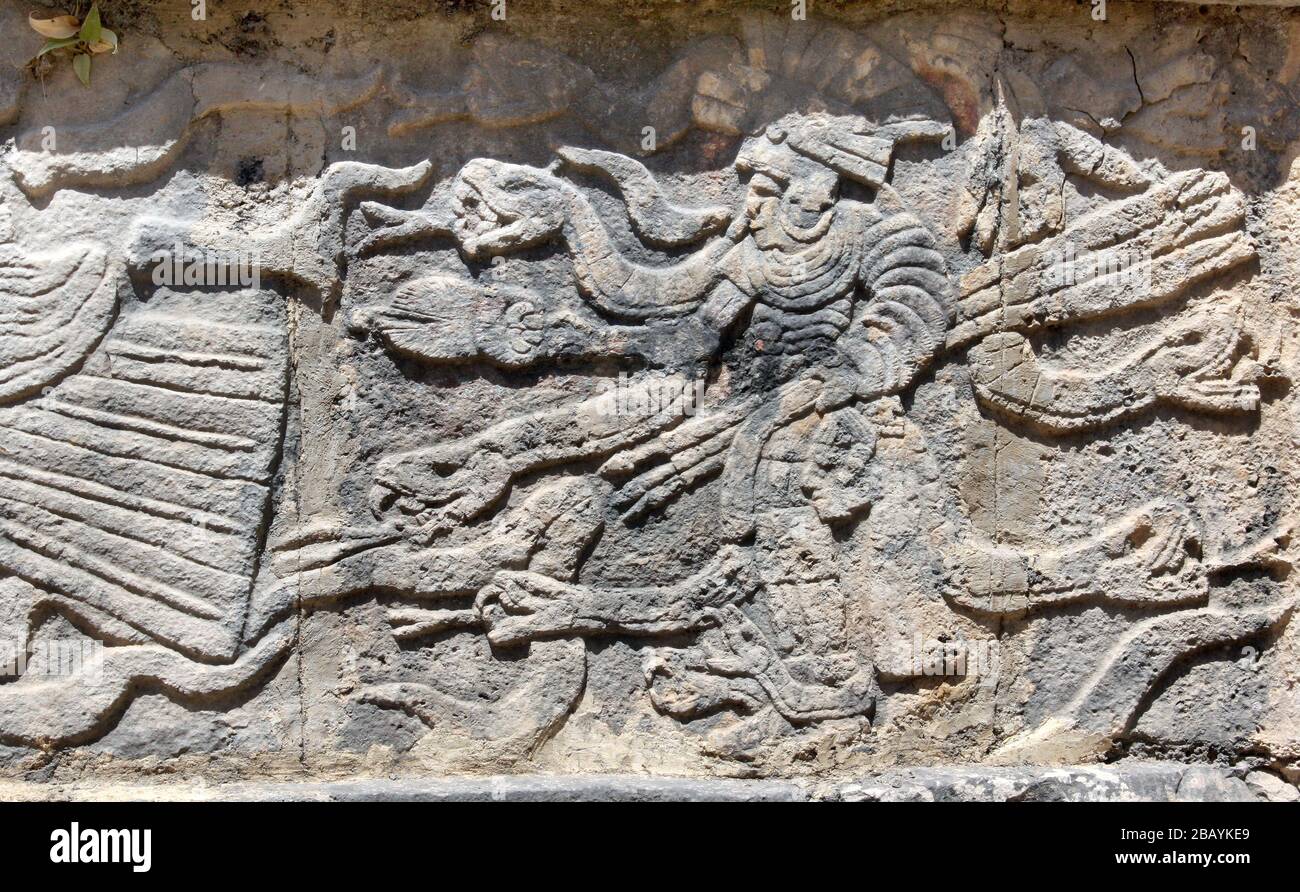 Bas-relief carving with indian warrior and serpent, pre-Columbian Maya ...