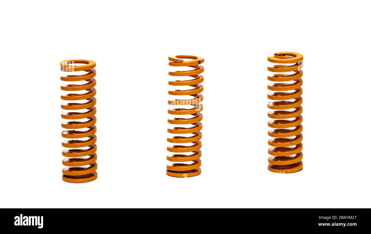 Three copper springs isolated on white background Stock Photo - Alamy