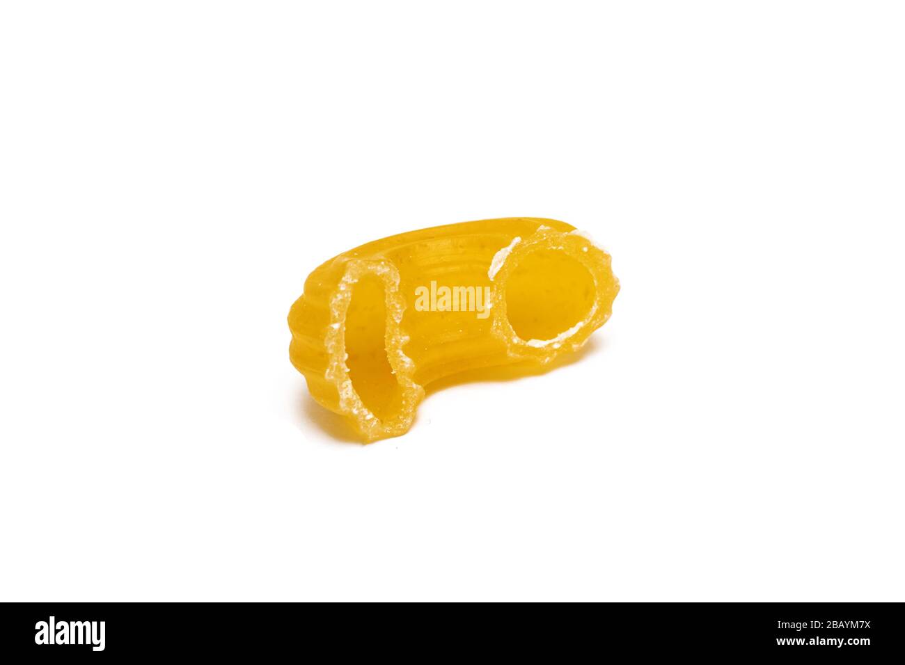 Yellow pasta isolated on a white background Stock Photo - Alamy