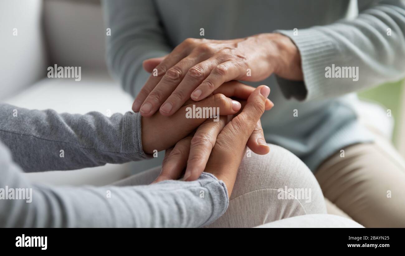 Adult support child hands hi-res stock photography and images - Alamy