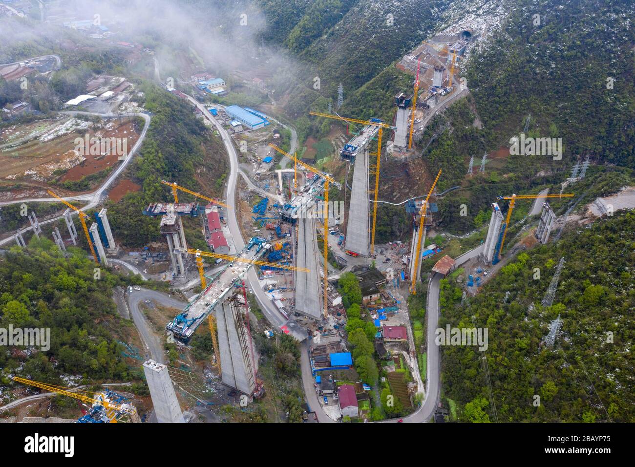 Xiangfan, China. 29th Mar, 2020. The workers return to construct the Zheng-Wan high-speed ...
