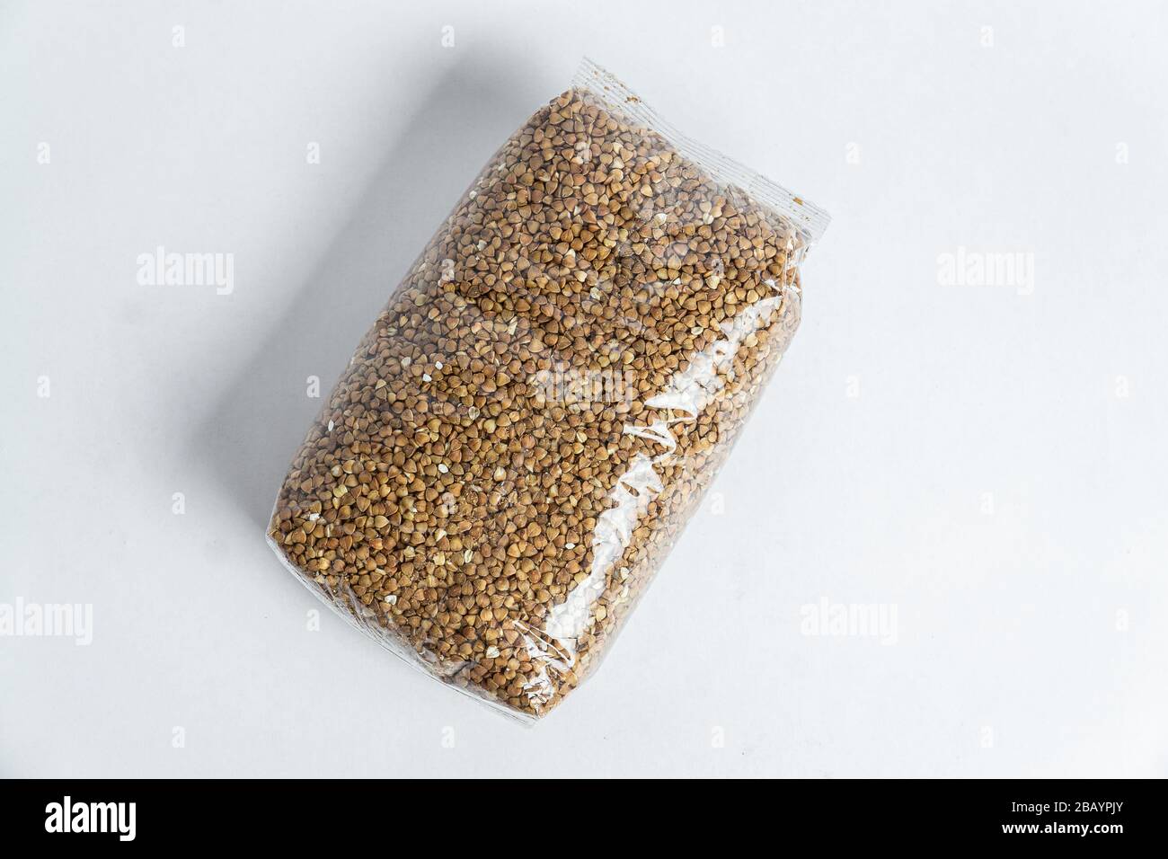 buckwheat in the plastic packet under the white background Stock Photo ...