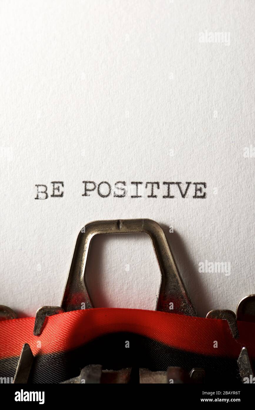The sentence, Be Positive, written with a typewriter Stock Photo - Alamy