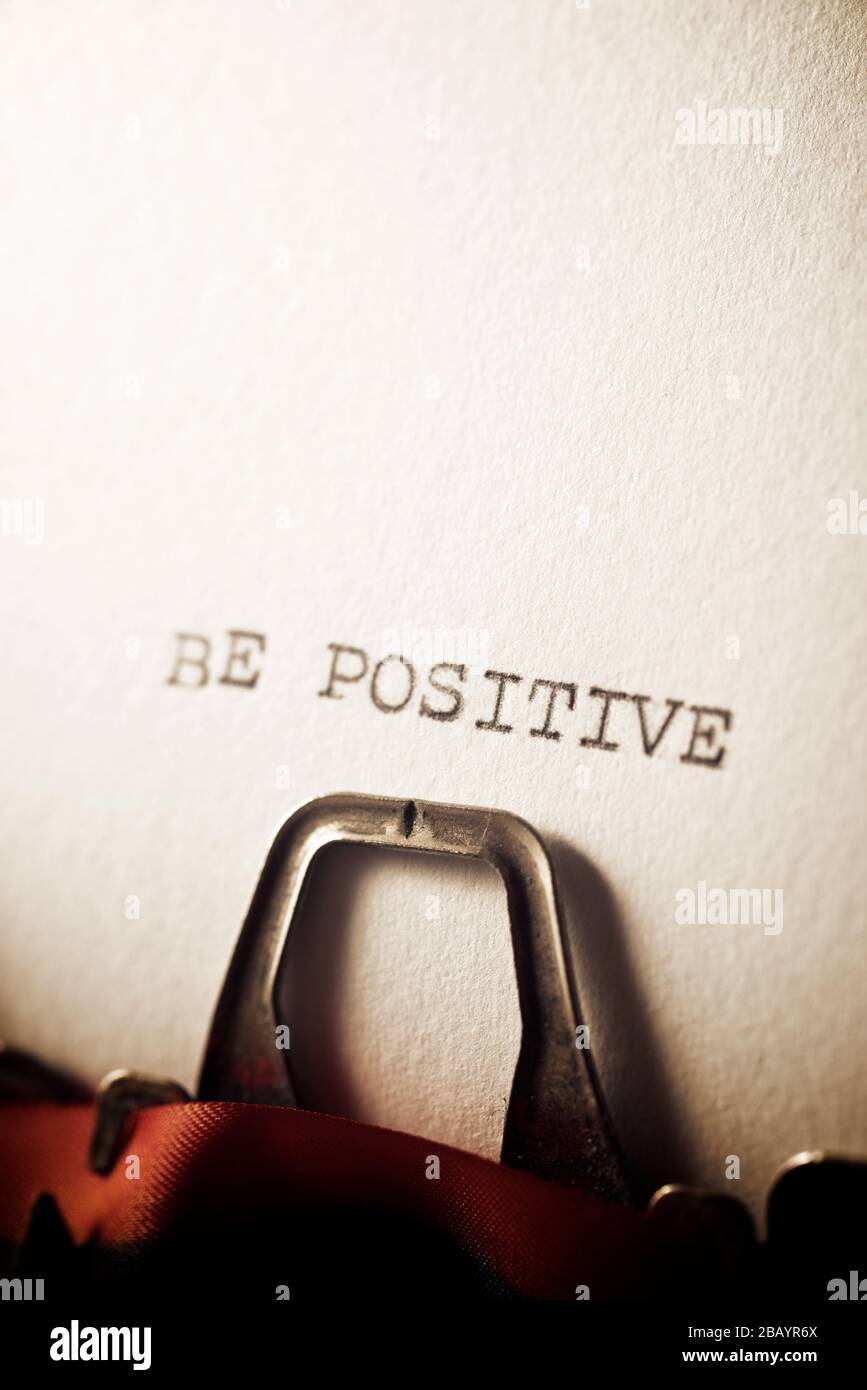 The sentence, Be Positive, written with a typewriter Stock Photo - Alamy