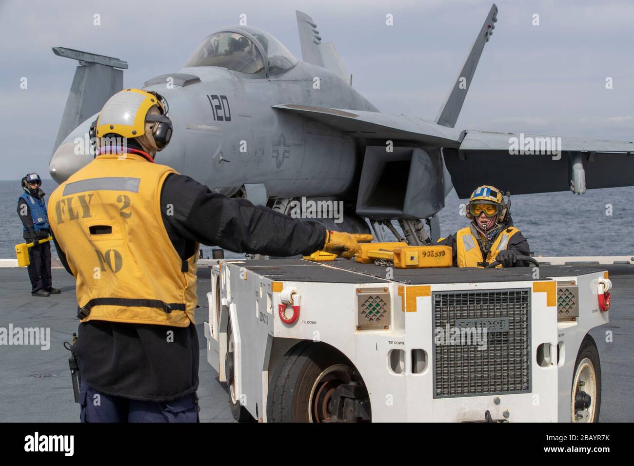 Us navy flight deck tractor hi-res stock photography and images - Alamy