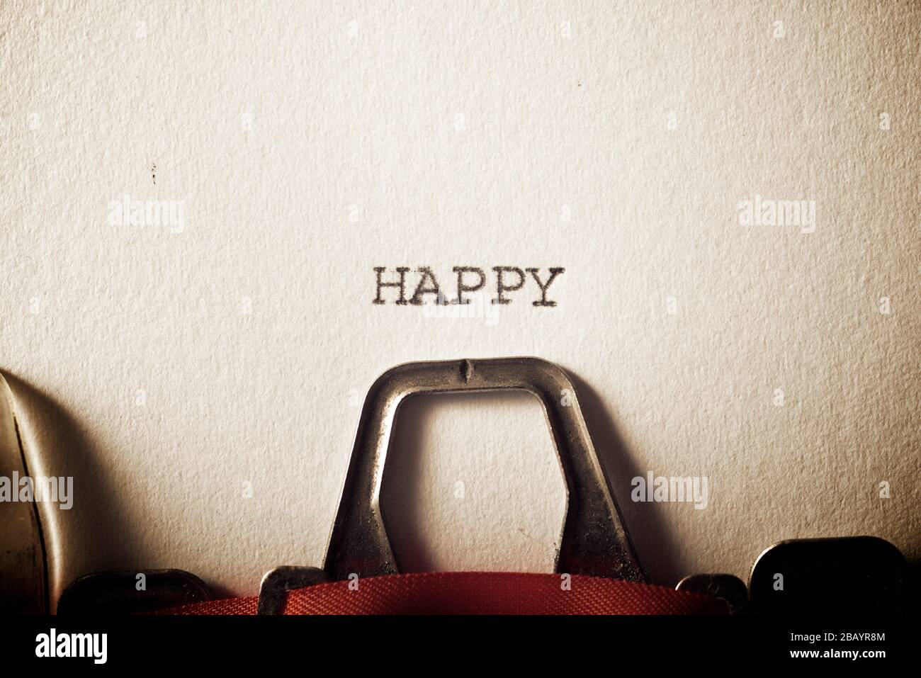 The word Happy written with a typewriter Stock Photo - Alamy