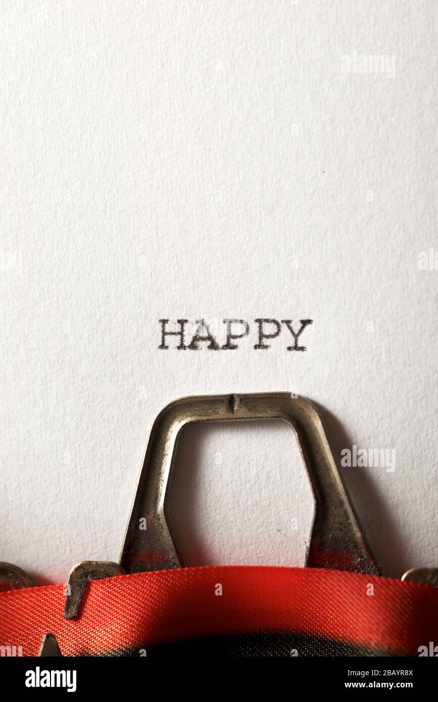 The word Happy written with a typewriter Stock Photo - Alamy