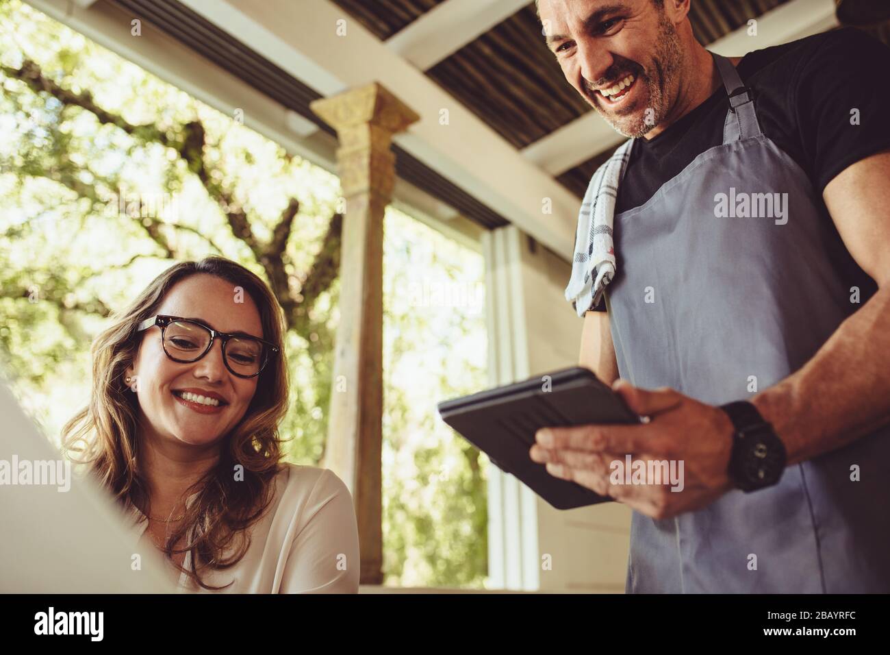 Female customer ordering from coffee hi-res stock photography and ...