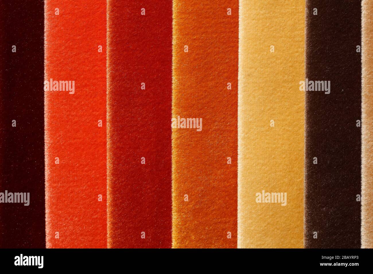 Contrast textile samples in warm tones close-up Stock Photo - Alamy