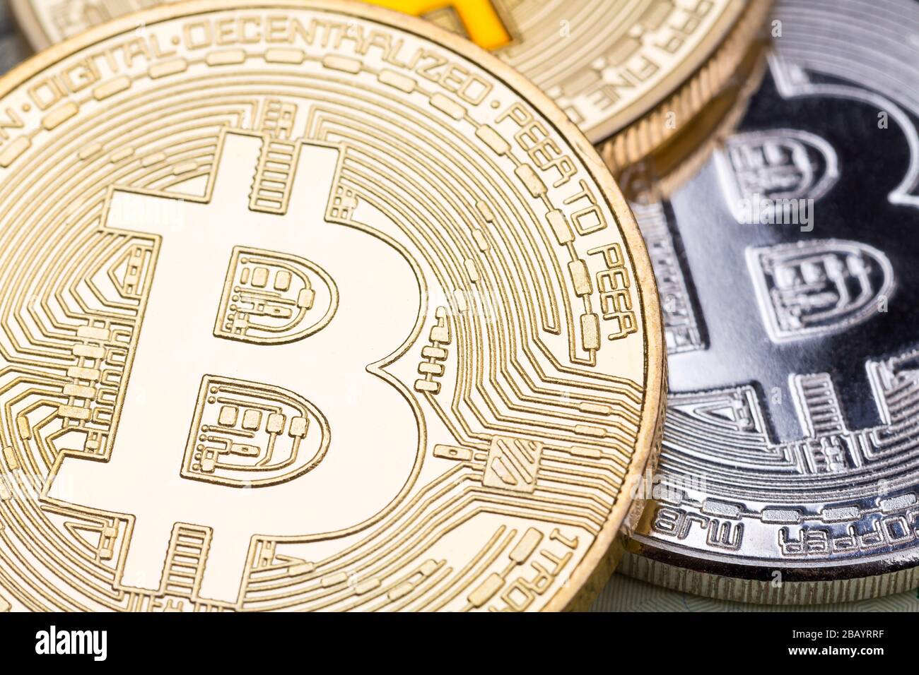 Three bitcoins can be used as background Stock Photo - Alamy