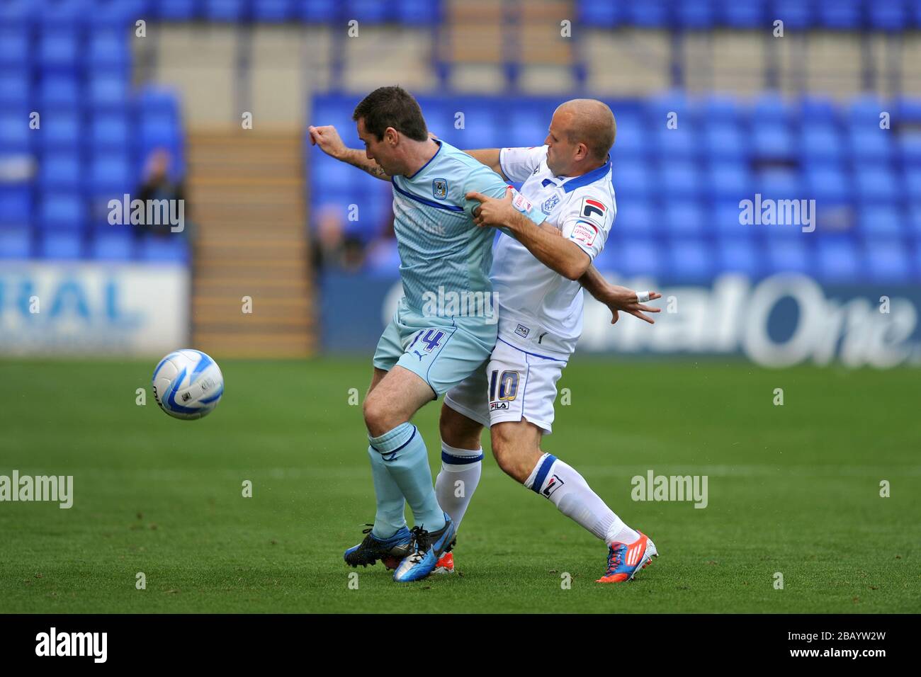 Coventry City's Stephen Elliott (left) and Tranmere Rovers' Andy ...