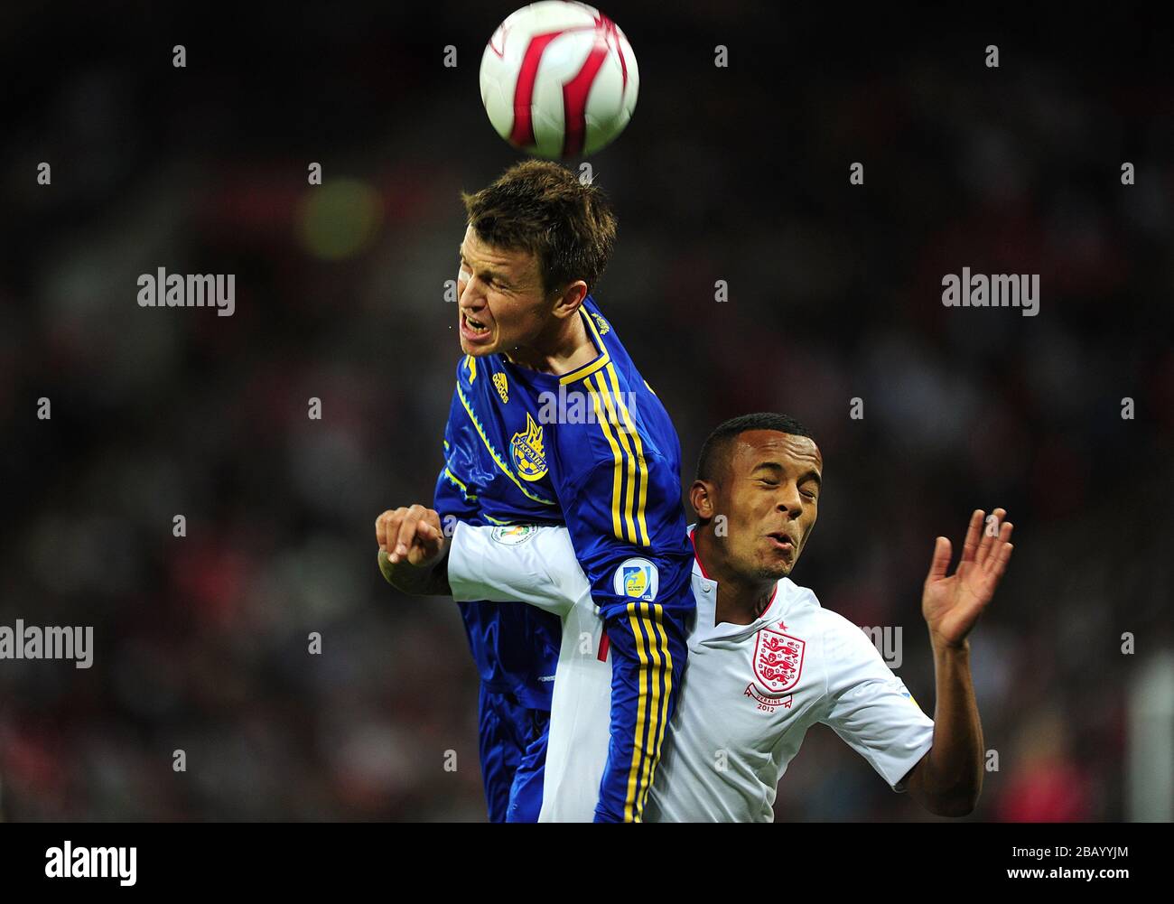 Ukraine's Ruslan Rotan (left) and England's Ryan Bertrand (right ...