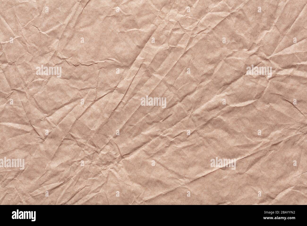 Crumpled paper texture in stylish beige color as part of your greeting ...