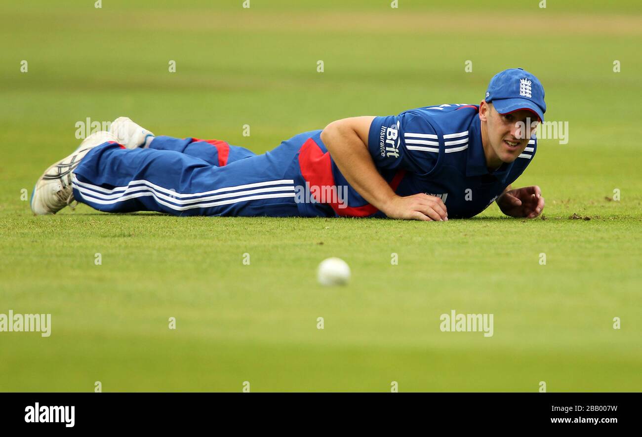 England's James Tredwell watches the ball run to the boundary against ...