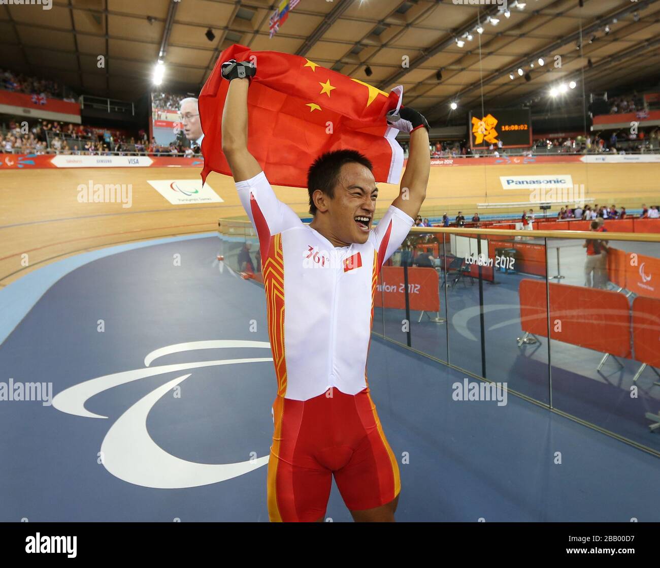 China's Xie Hao celebrates winning Gold in the Mixed C1 to 5 Team ...