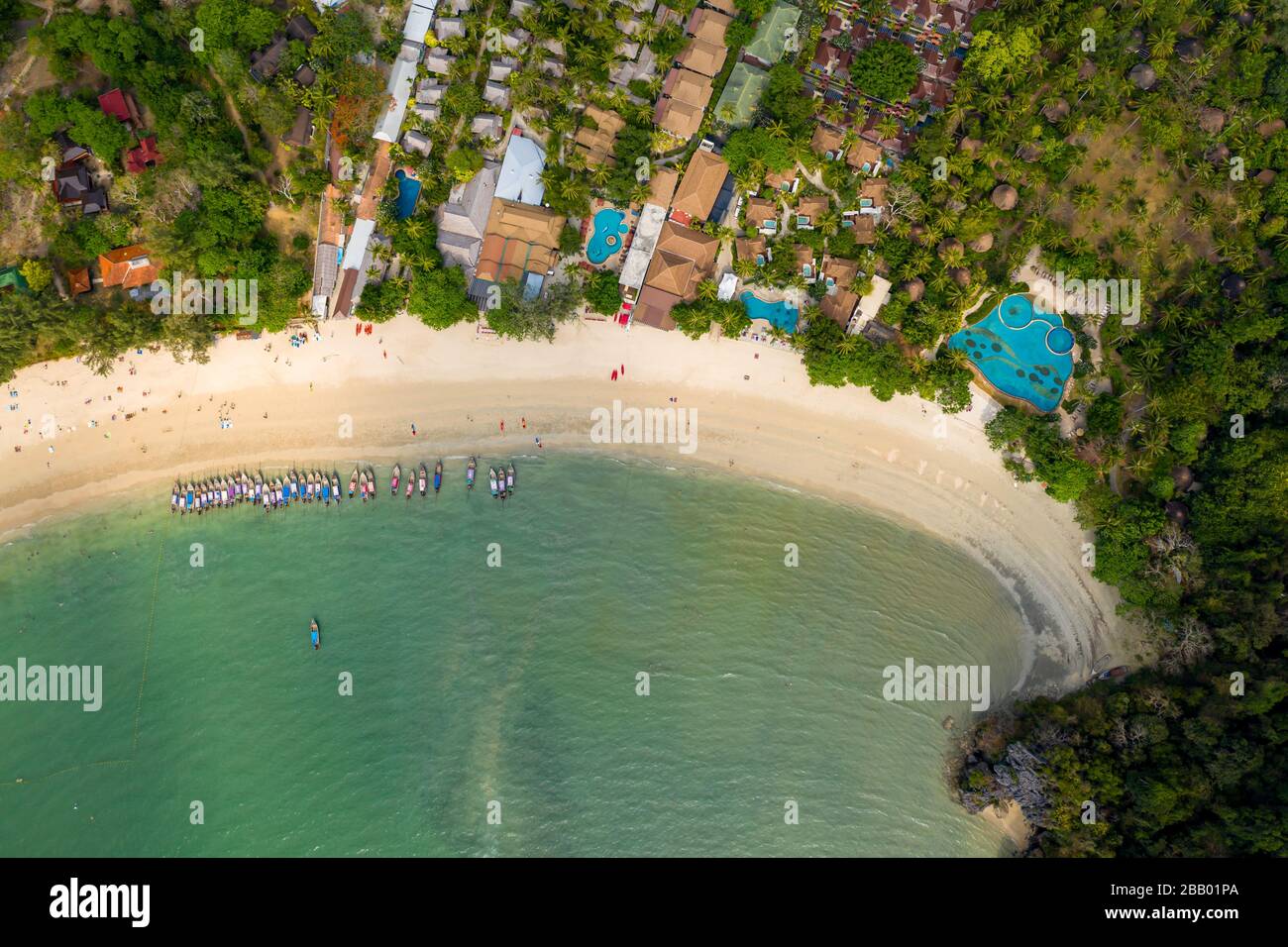 Aerial drone view of boats around a beautiful tropical beach (Railay ...