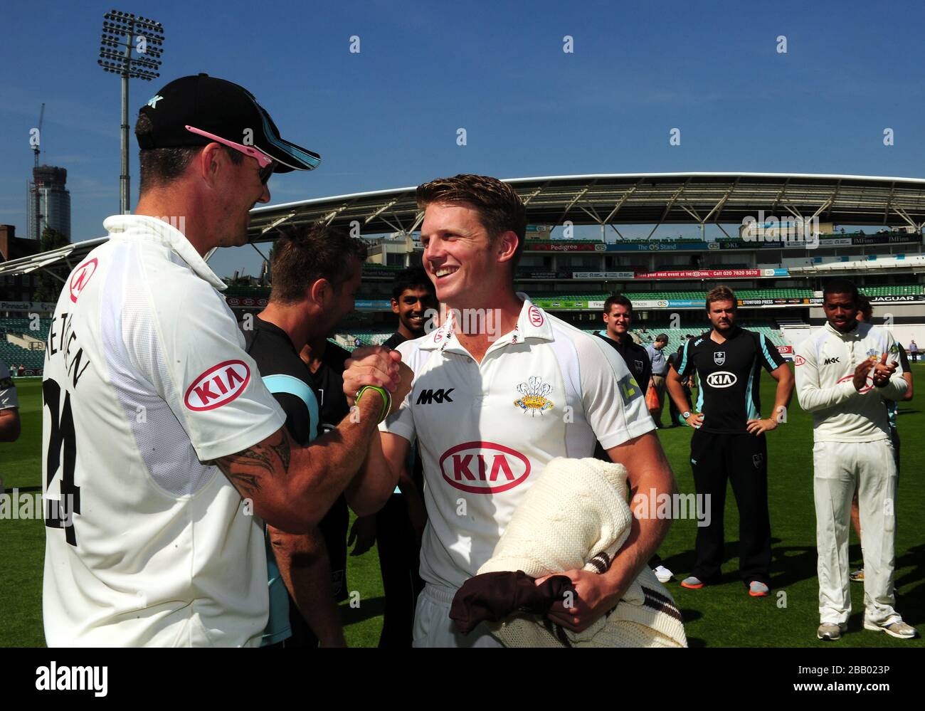 Surrey's Stuart Meaker (right) shakes hands with Kevin Pietersen Stock ...
