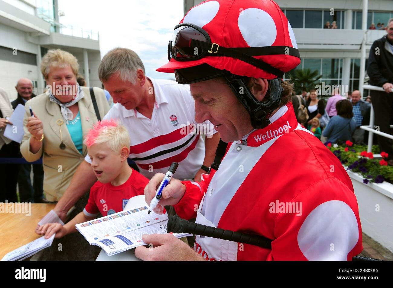 Jockey Jimmy Fortune signs autographs before his race Stock Photo - Alamy