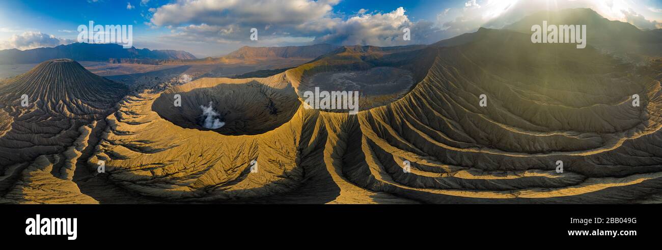 Aerial view of a spectacular volcanic landscape in golden, late evening ...