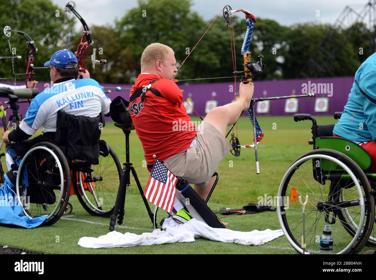 USA's Matt Stutzman holds the bow with his foot as he competes during ...