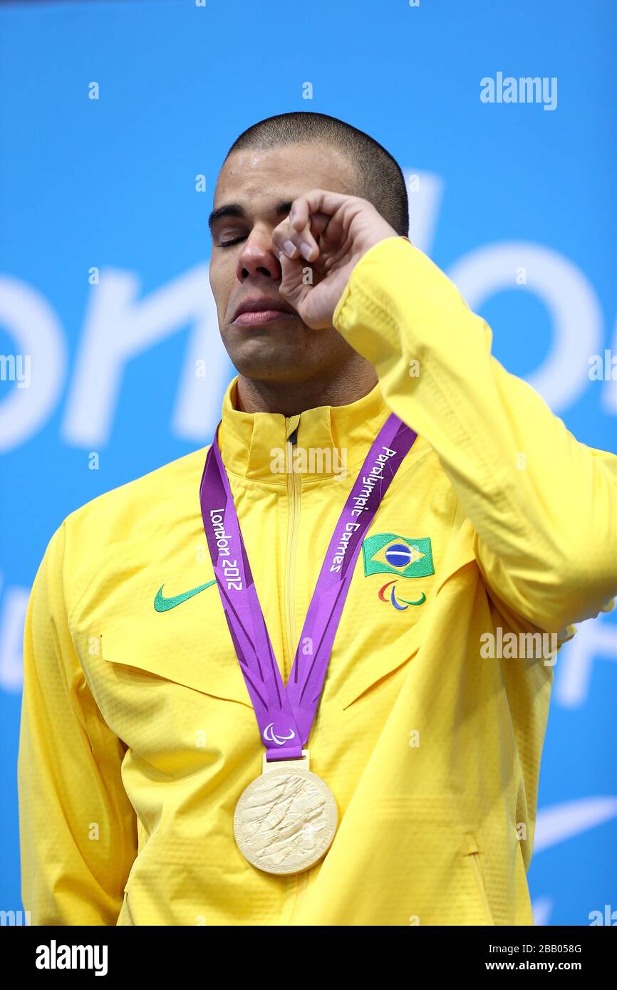 Brazil's Andre Brasil shows his emotion during the medal ceremony ...