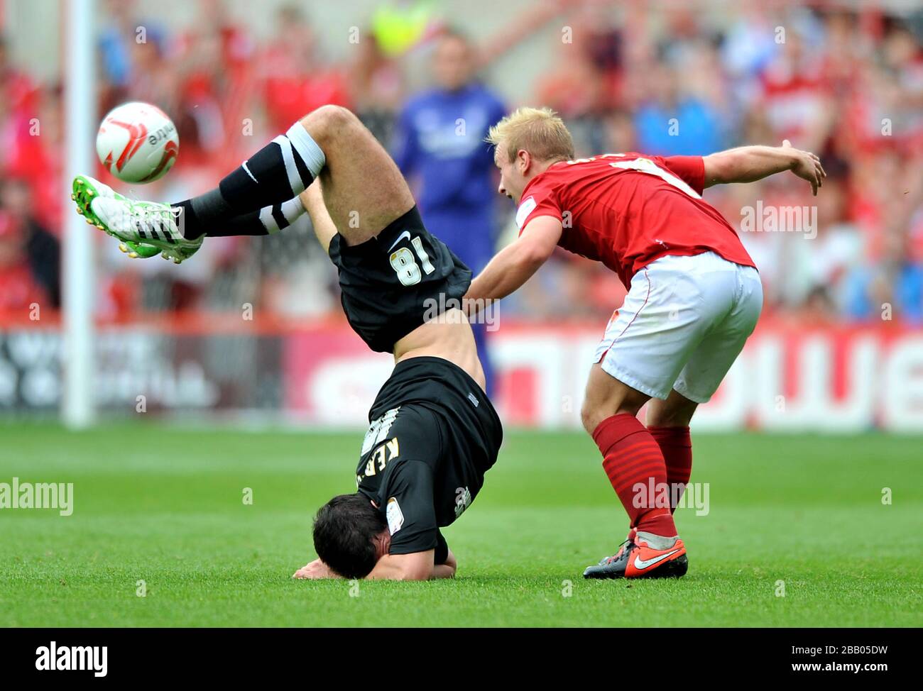 Nottingham Forest's Simon Gillett tangles with Charlton Athletic's Yann ...