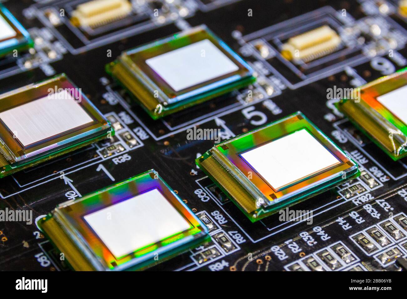 Several microdisplays bright of white color on the test station ...