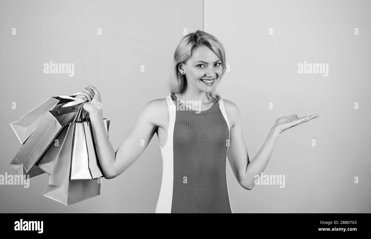 Satisfied with her shopping. Discounts and loyalty program. Save money ...