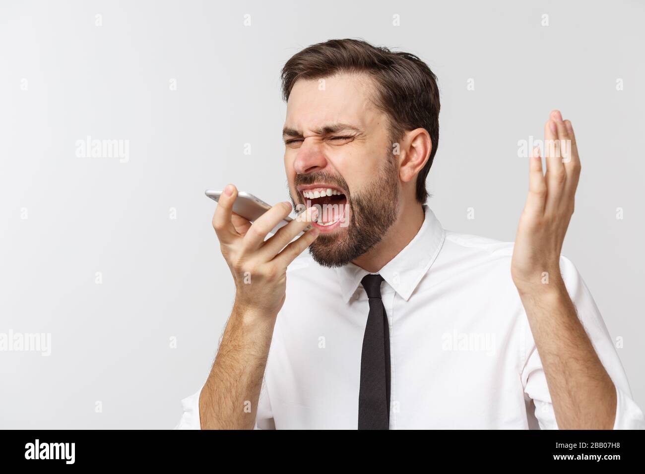 Serious angry man talking hi-res stock photography and images - Alamy