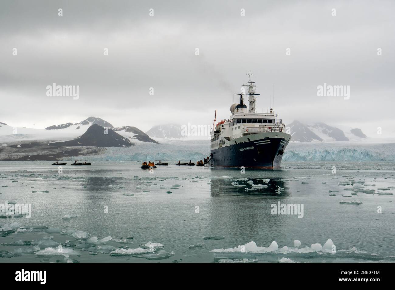 Cruise ship in the Arctic sea ice in Svalbard, Norway in June Stock ...
