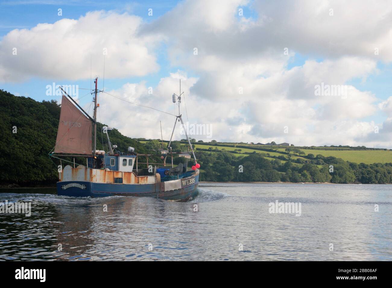 A quiet reach of the Helford River near Tremayne Quay looking ...
