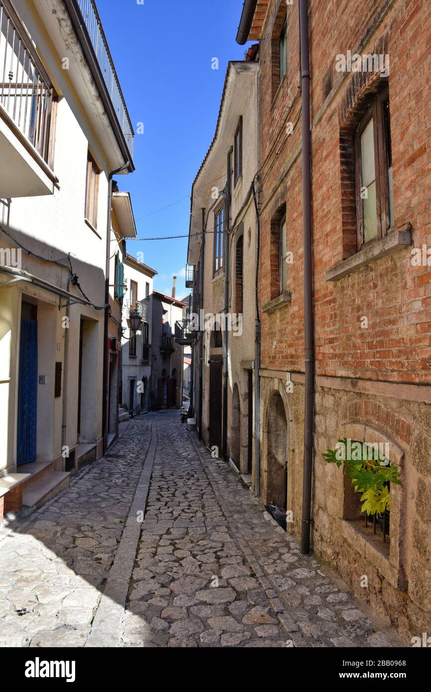 Castelvetere sul Calore, Italy. A narrow street between the old houses ...