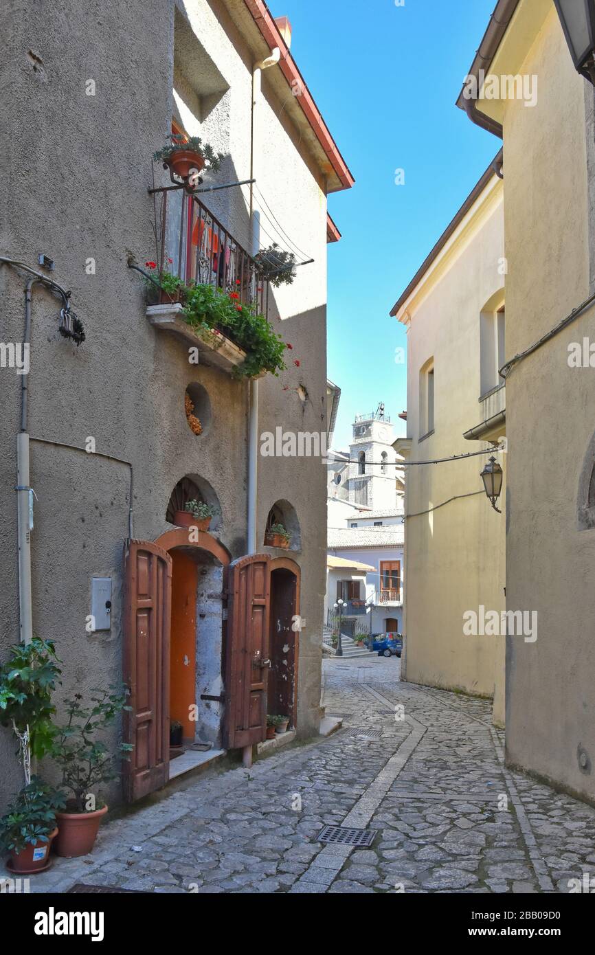 Castelvetere sul Calore, Italy. A narrow street between the old houses ...