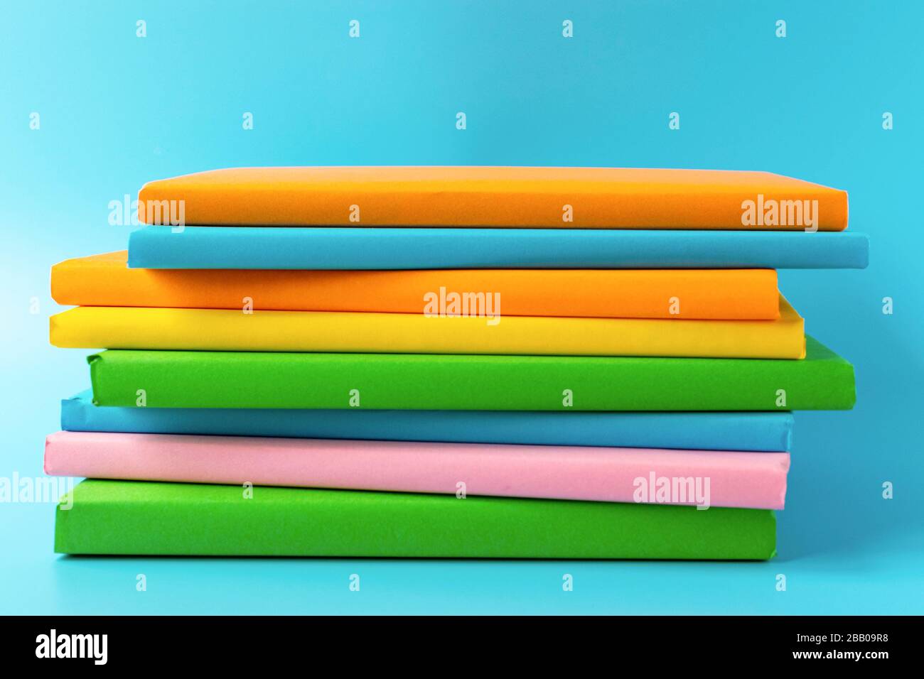 A stack of books, textbooks. Distance learning. Schoolboy is doing ...