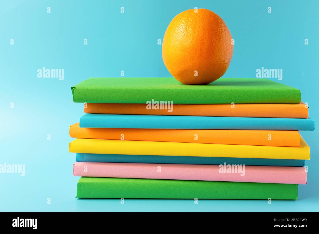 A stack of books, textbooks. Distance learning. Schoolboy is doing ...