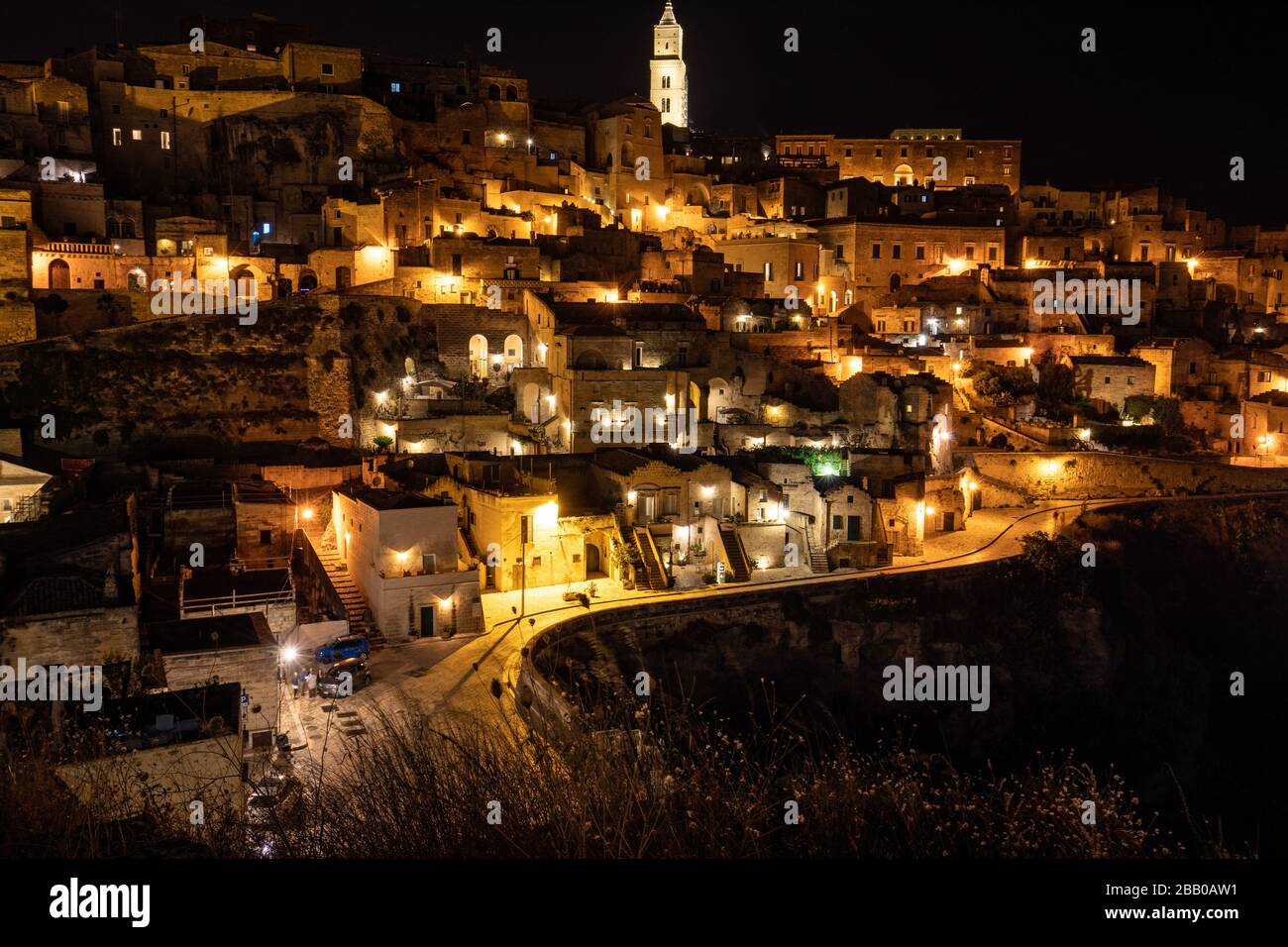 Amazing lighted buildings in ancient Sassi district by night in Matera ...