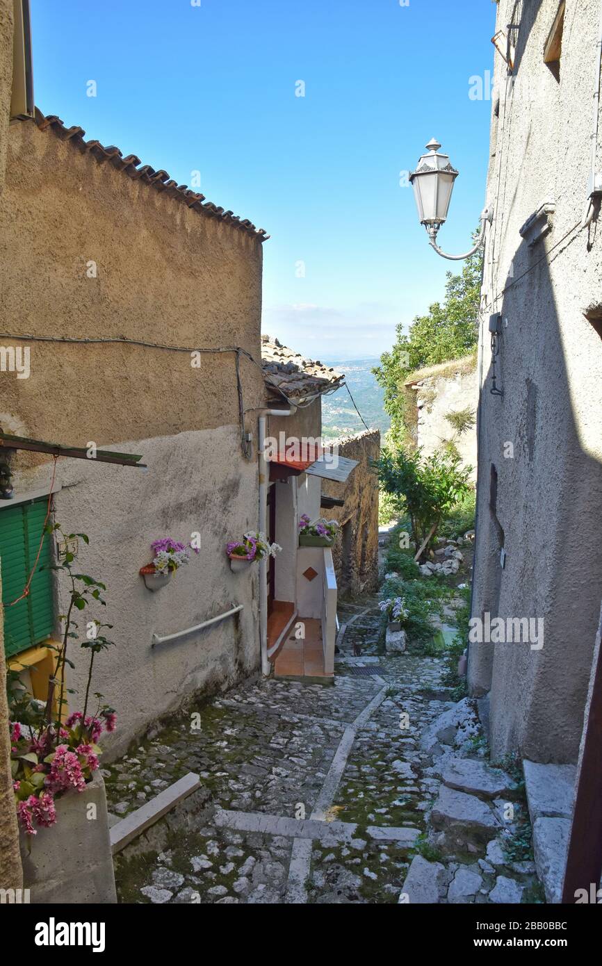 Castelvetere sul Calore, Italy. A narrow street between the old houses ...