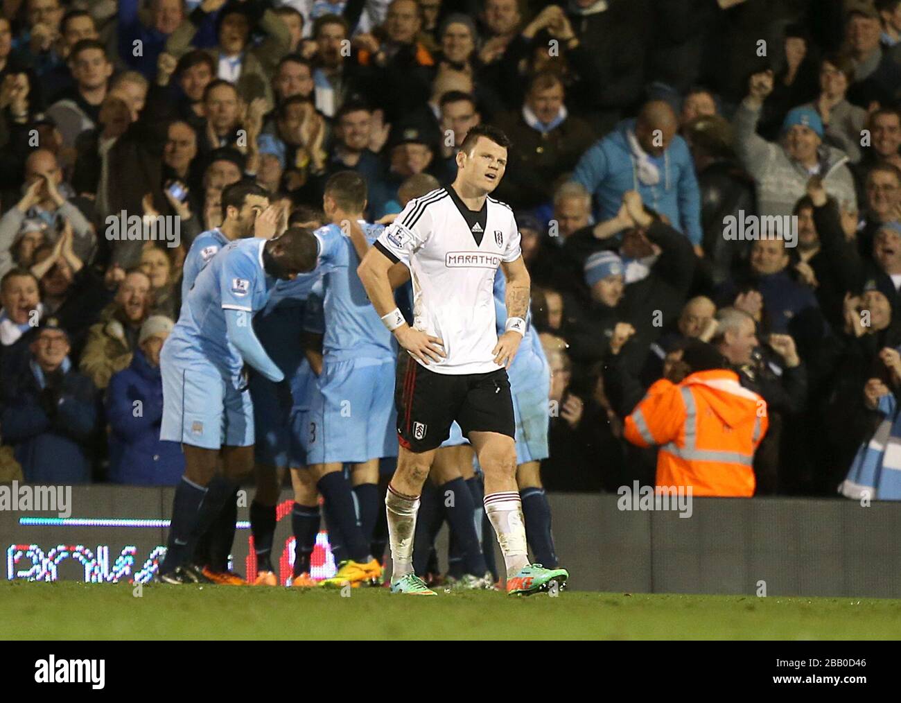 Fulham's John Arne Riise appears dejected after Manchester City's Jesus ...