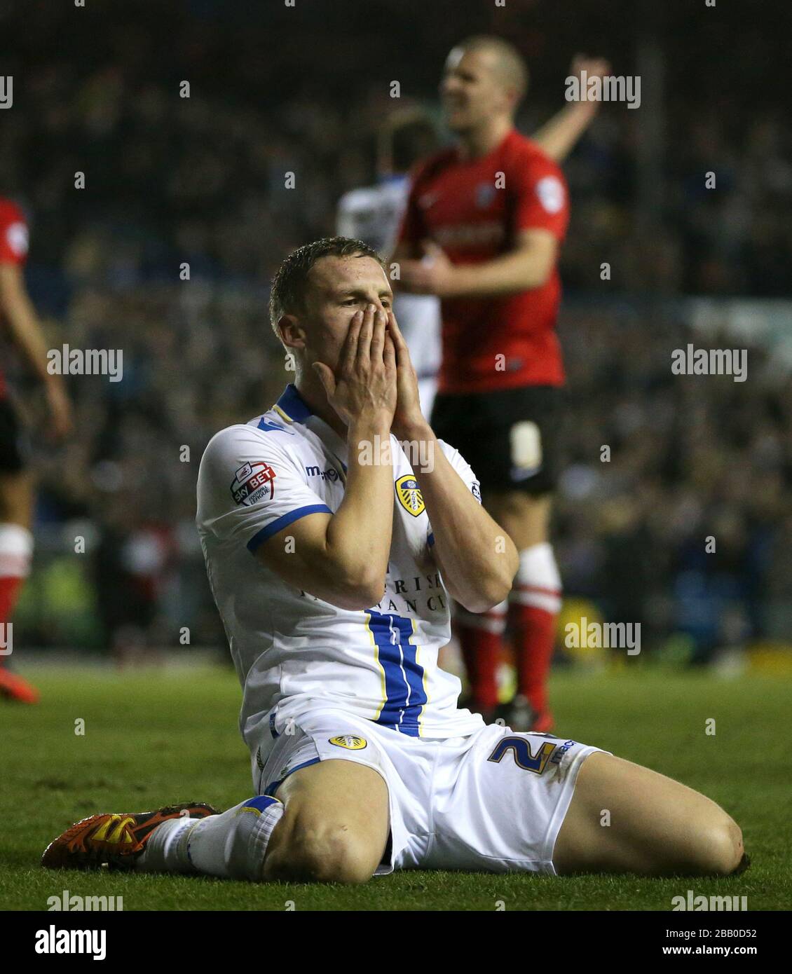 Leeds United's Matt Smith sinks to his knees after a narrow miss Stock ...