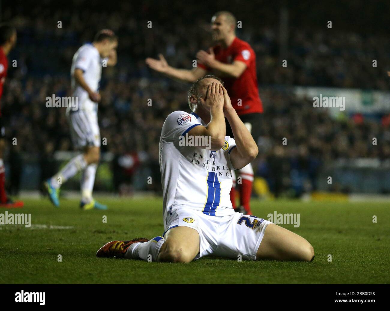 Leeds United's Matt Smith sinks to his knees after a narrow miss Stock ...