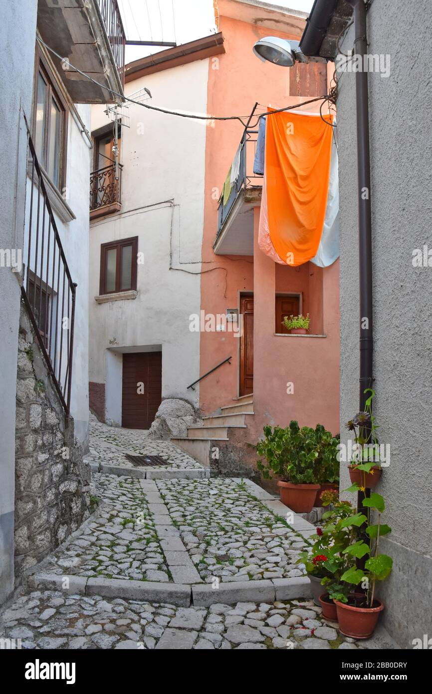 Castelvetere sul Calore, Italy. A narrow street between the old houses ...