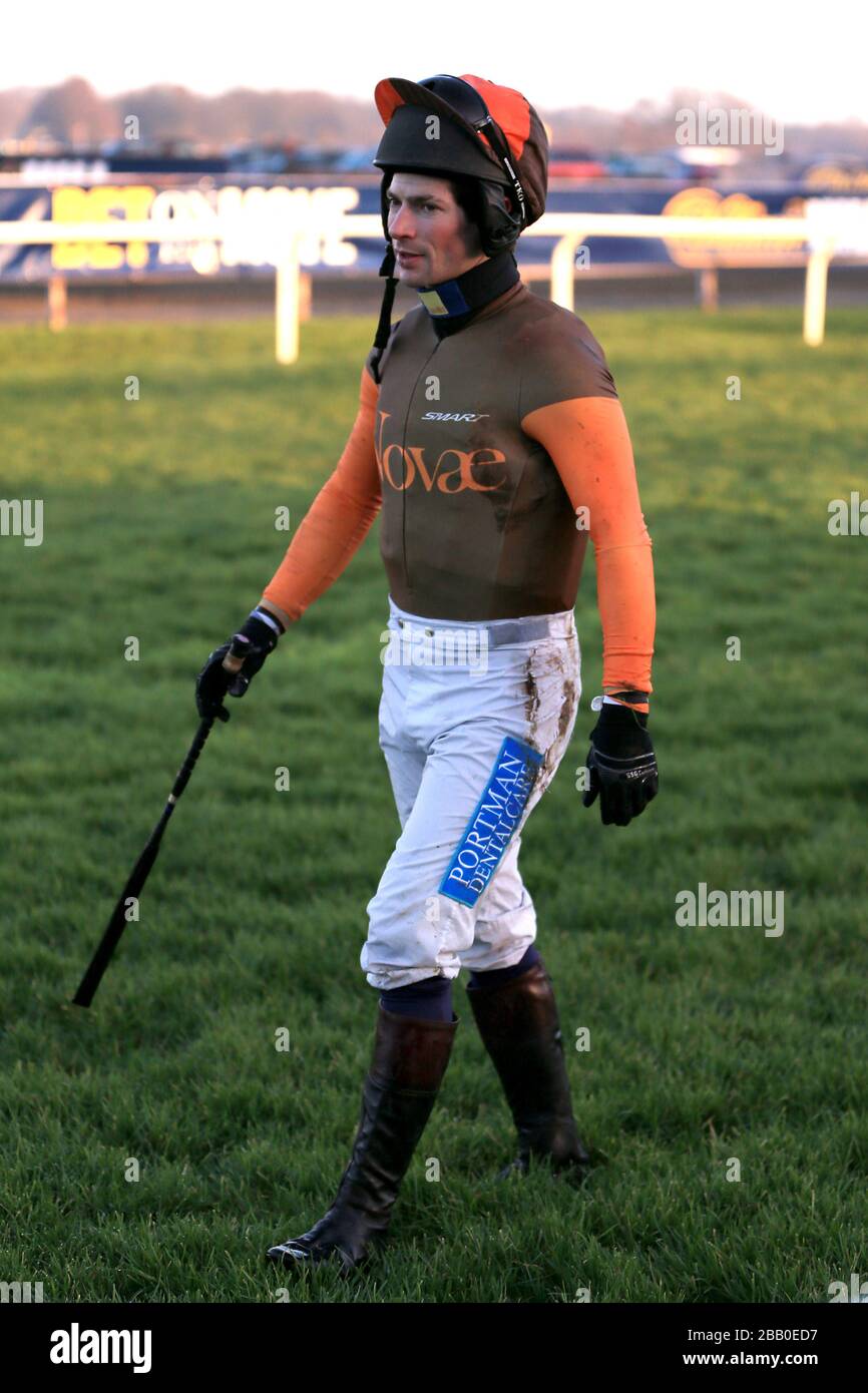 Jockey Sam Waley-Cohen after falling at final fence on Long Run during ...