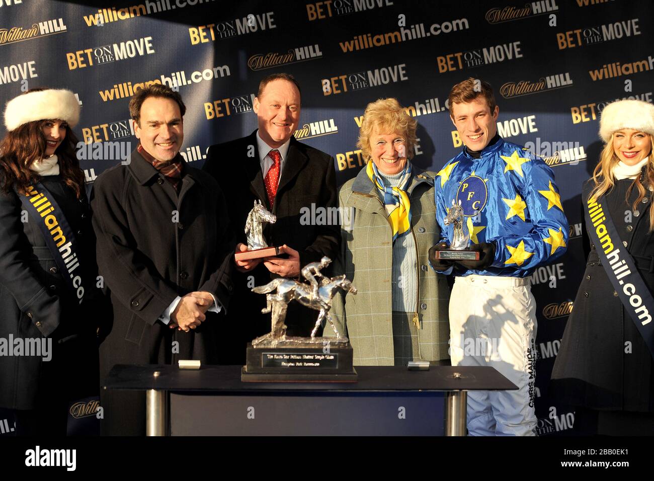 Presentation to jockey Ian Popham (right) and trainer Martin Keighley ...
