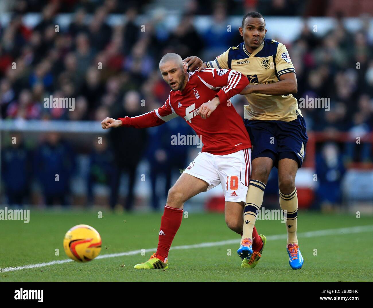 Nottingham Forest's Henri Lansbury (left) and Leeds United's Rudolph ...