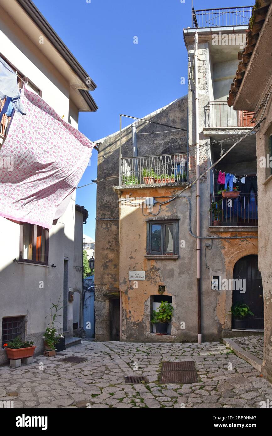 Castelvetere sul Calore, Italy. A narrow street between the old houses ...