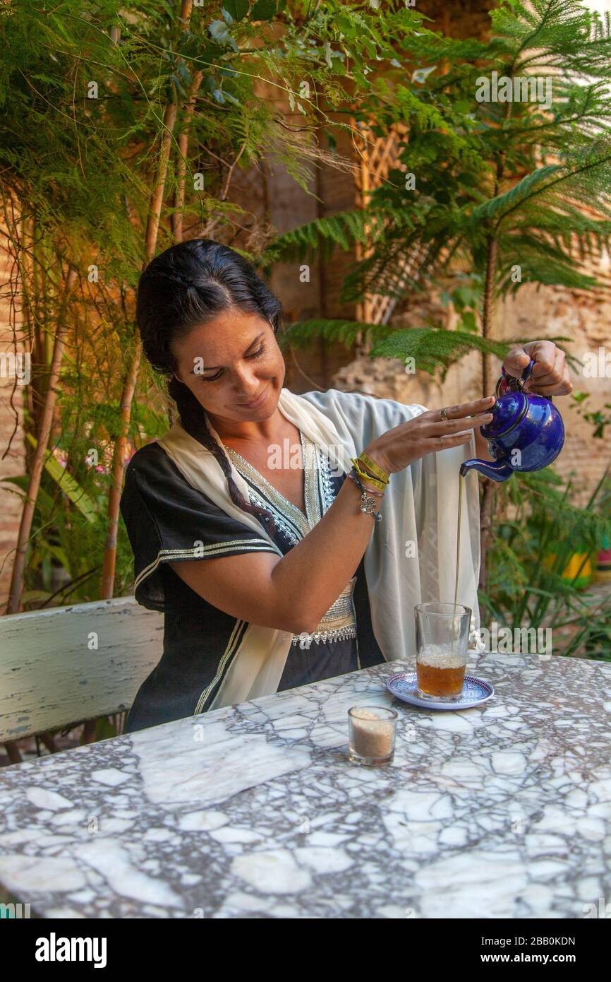 Morocco tea pouring hi-res stock photography and images - Alamy