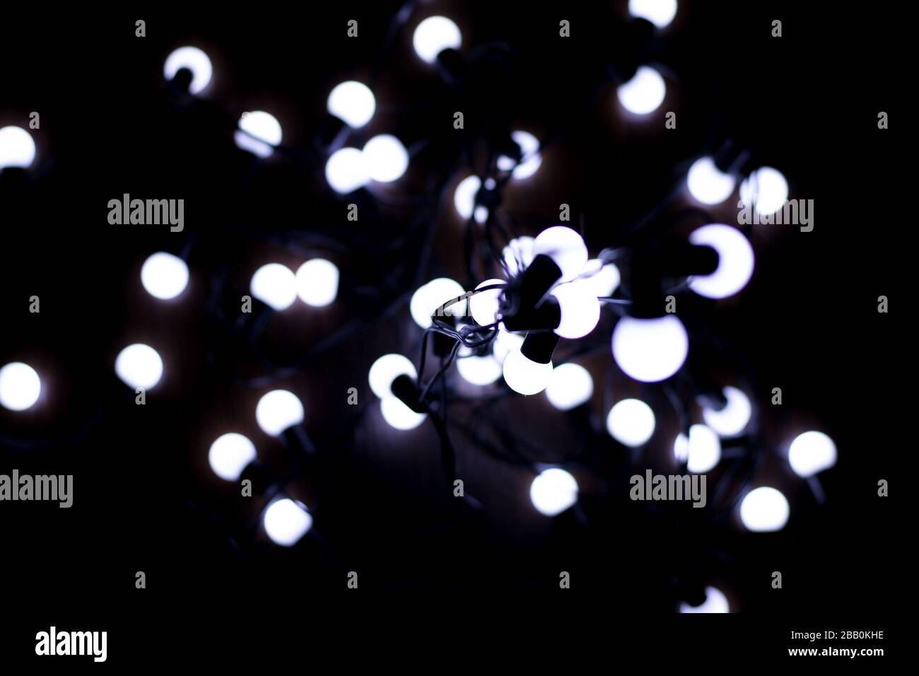 Little white lights on a garland, blur, creative background Stock Photo ...