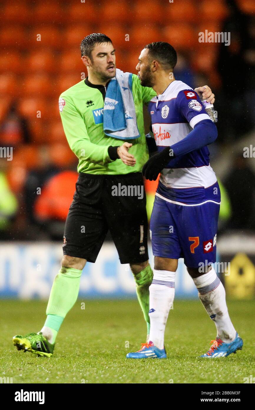 Queens Park Rangers' Matt Phillips (left) and Blackpool goalkeeper ...