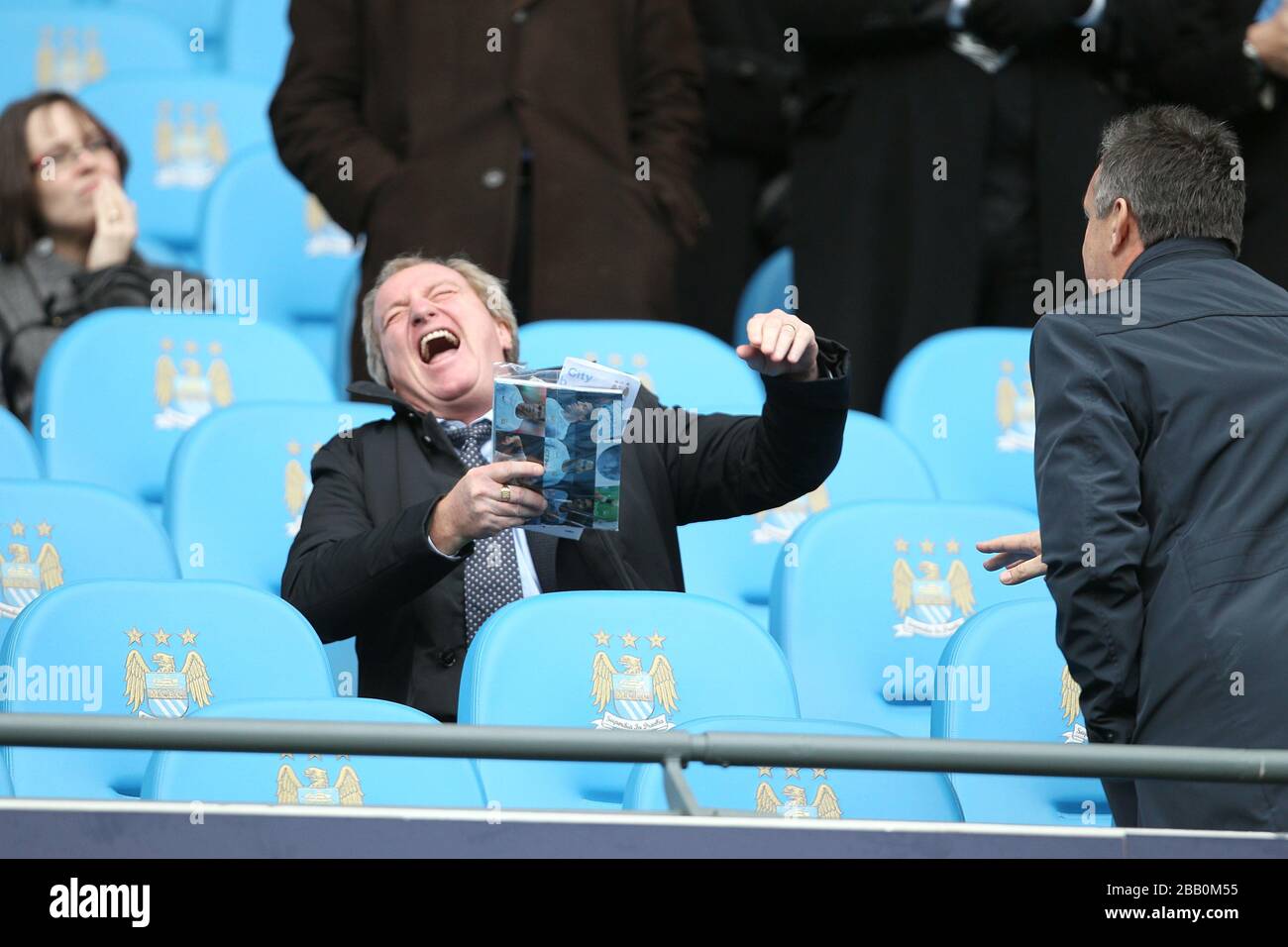 England assistant manager Ray Lewington laughs as he sits in the stands ...